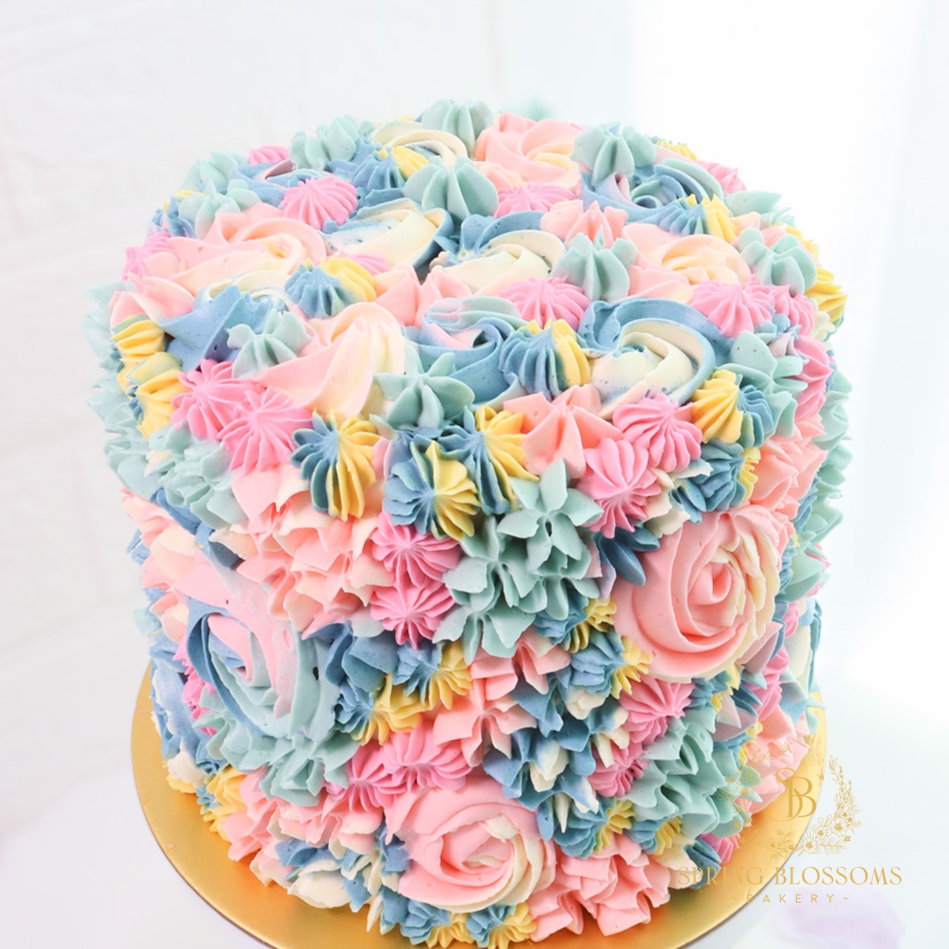Rainbow Celebration Rosette Cake - Spring Blossoms Bakery